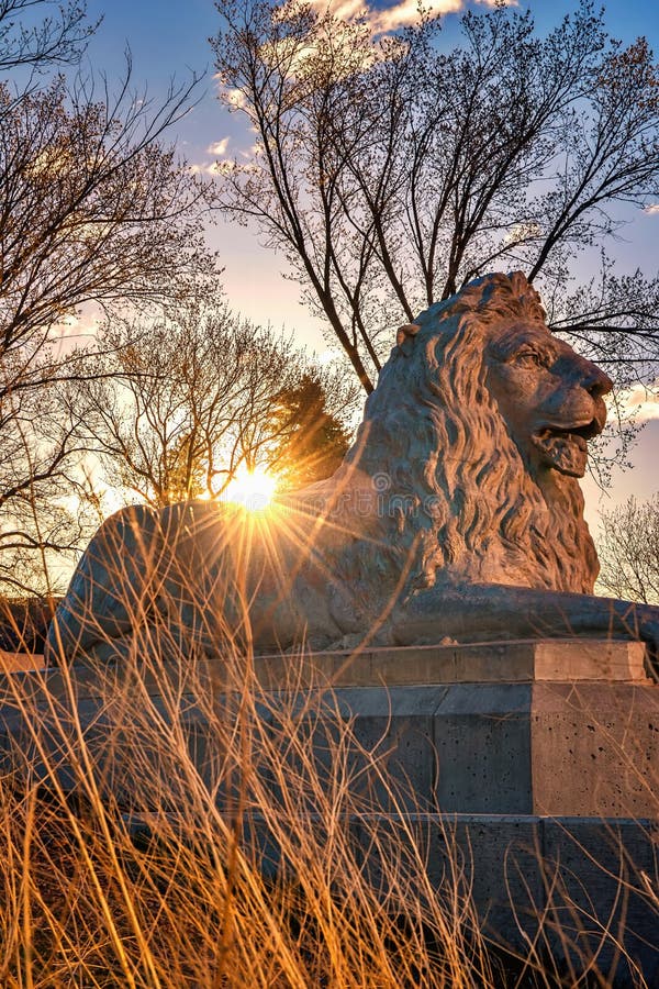 Sunshine Glowing Over a Park Statue Stock Image - Image of calgary ...