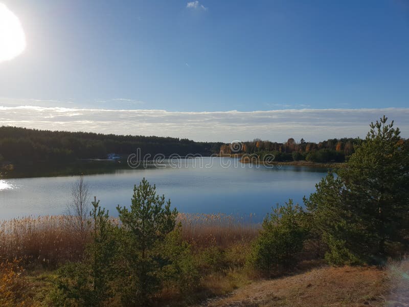 Sunshine by the lake stock photo. Image of nature, blue - 142865540