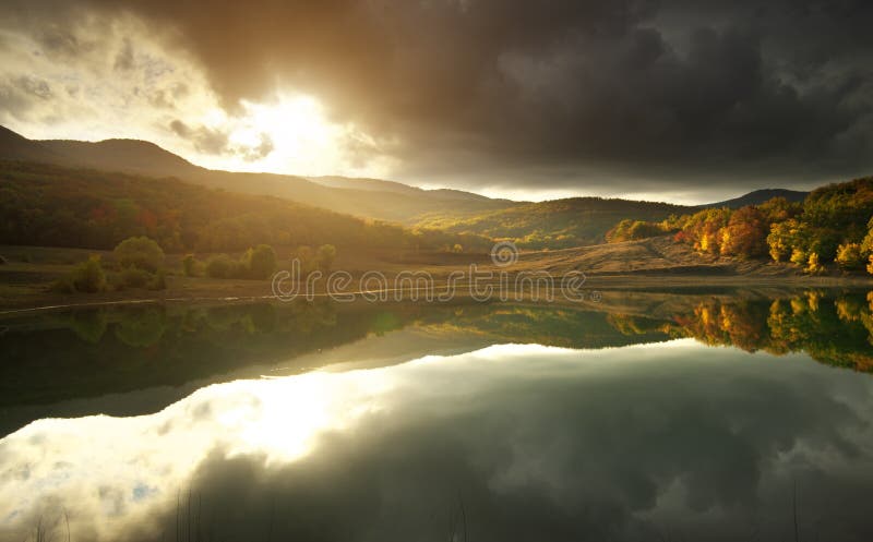 Sunshine on the lake. stock image. Image of dawn, morning - 130170513