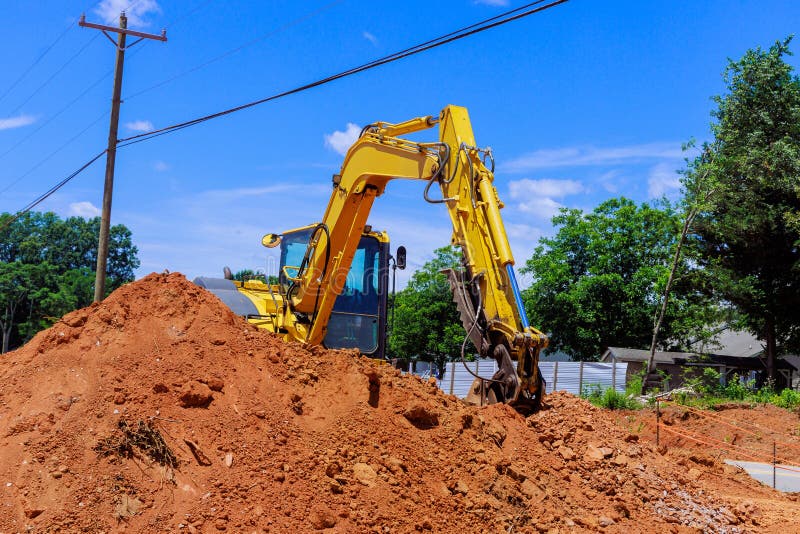 In Sunshine, Large Construction Excavator is Observed on a Construction ...