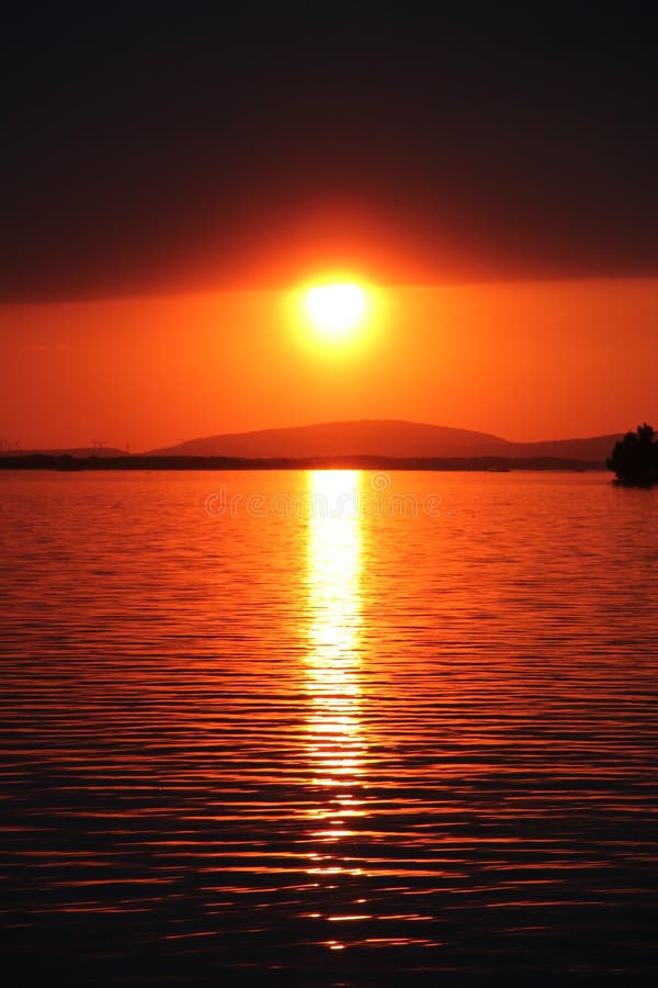 Sunset on the river stock photo. Image of shore, coast - 267572606
