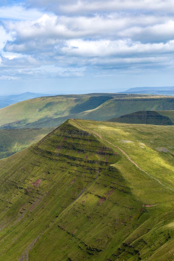 Sunshine and Shadows on the Summit of a Green Mountain Top in Summer ...