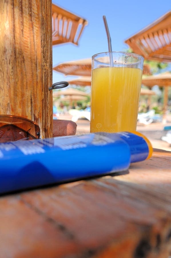 Suntan cream and beverage stock photo. Image of relaxation - 3648876
