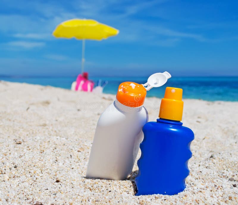 Suntan lotion bottles stock image. Image of reflection - 30951621