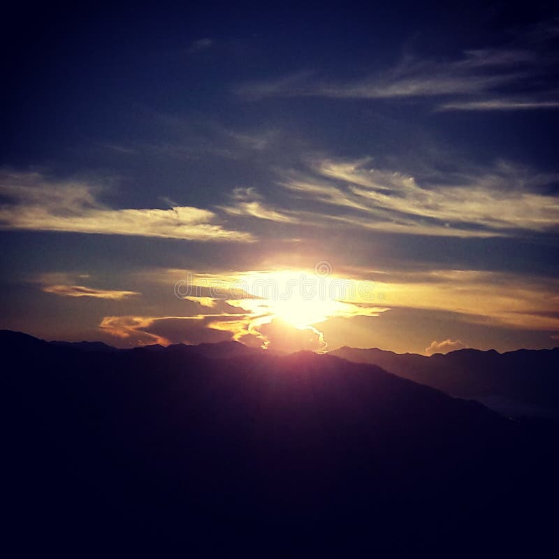 Sunup stock image. Image of sunrise, clouds, peak, mountain - 97993189