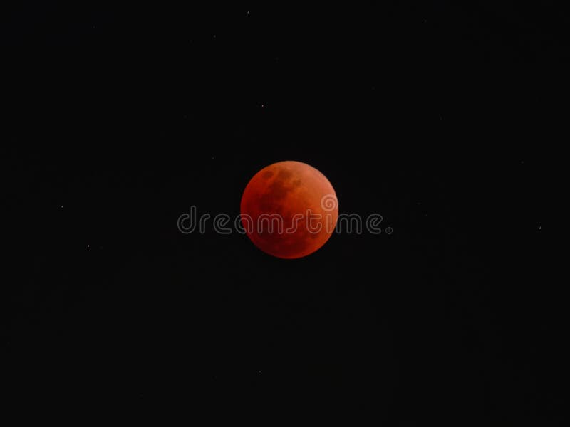 Super Blue Blood Moon with Partial Lunar Eclipse Over Dark Sky ...