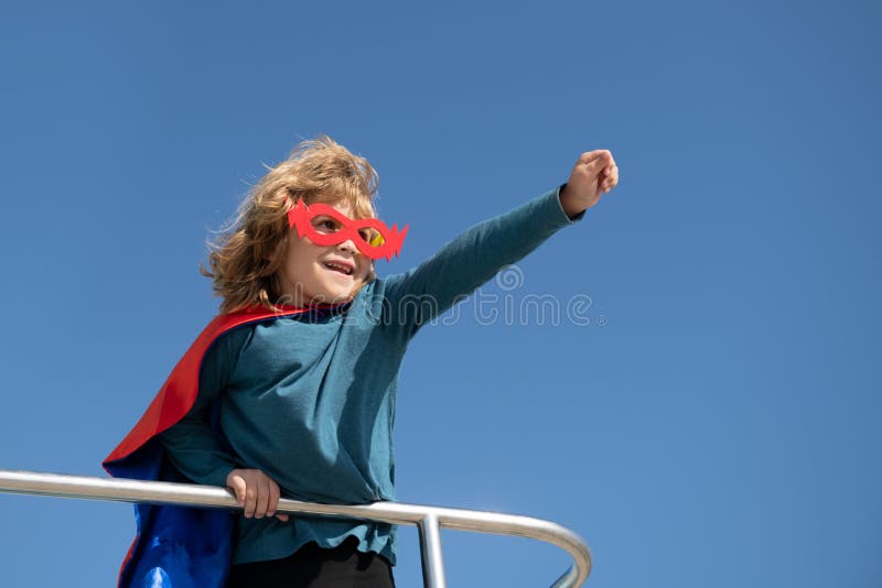 Super Hero Child in a Red Superhero Coat. Super Hero Concept. Stock ...