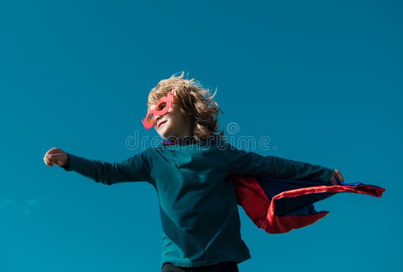 Super Hero Child in a Red Superhero Coat. Super Hero Concept. Stock ...