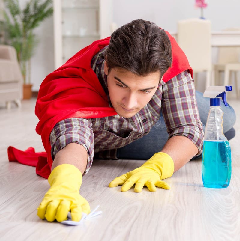 Super Hero Husband Cleaning Floor at Home Stock Photo - Image of ...
