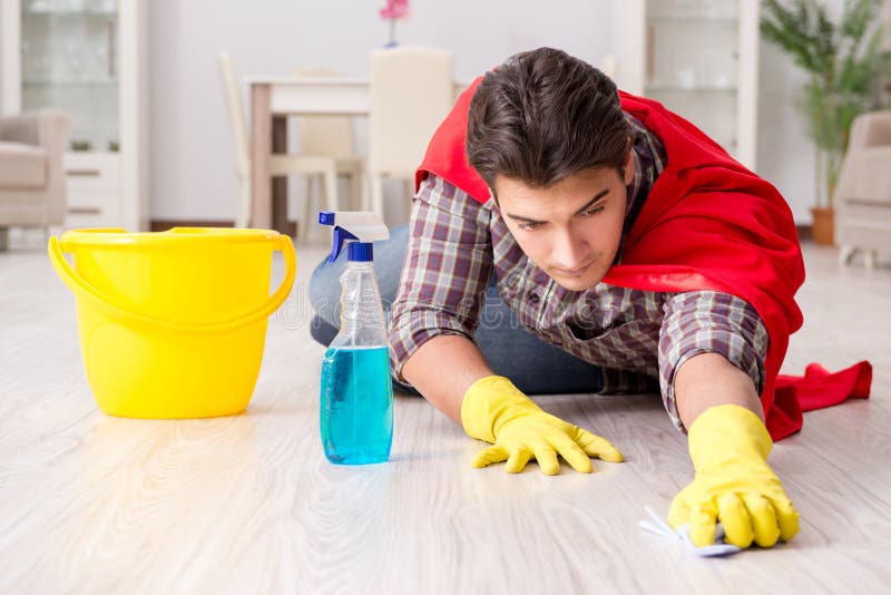 The Super Hero Husband Cleaning Floor at Home Stock Photo - Image of ...