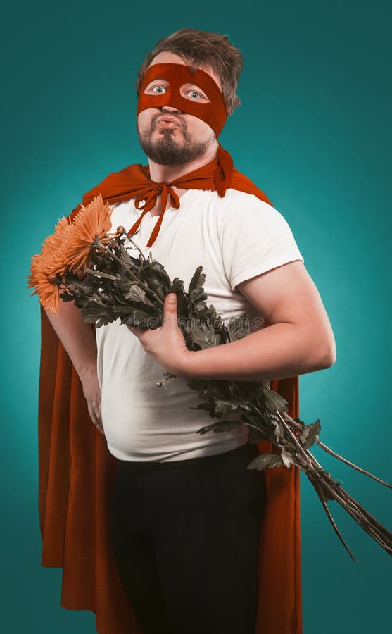 Super Hero In Love With A Bouquet Of Flowers For His Lover Man In A