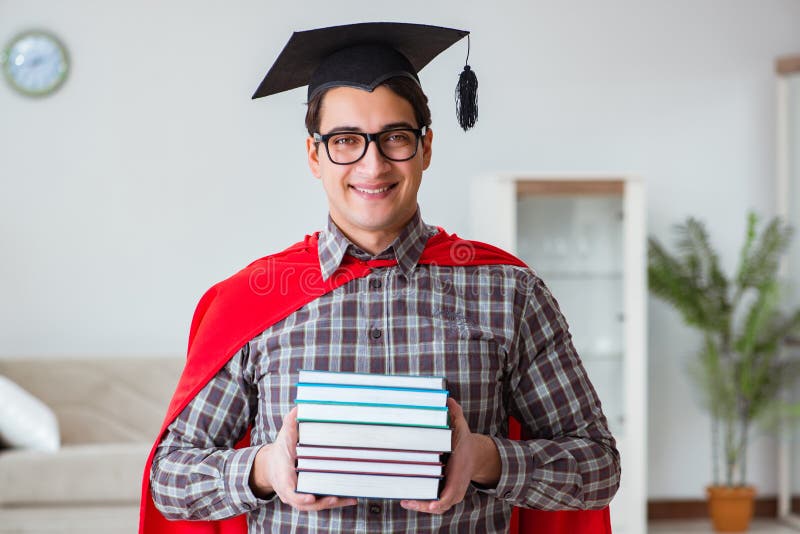 The Super Hero Student with Books Studying for Exams Stock Photo ...