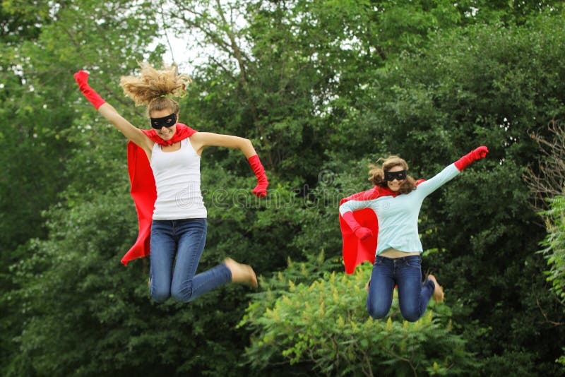 Super heros team jumping stock image. Image of power - 25692145