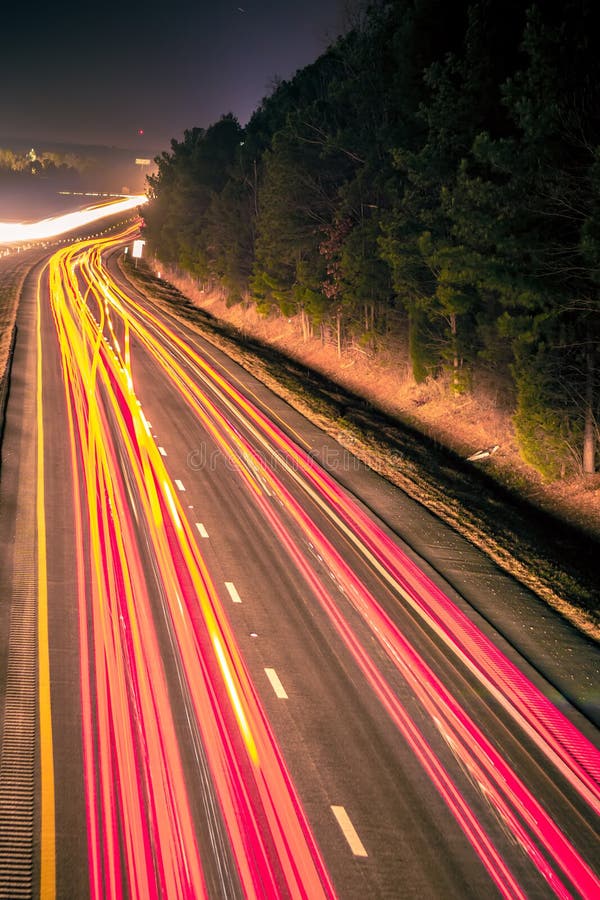 Super highway with high volume of cars at night. Motorist, driver ...