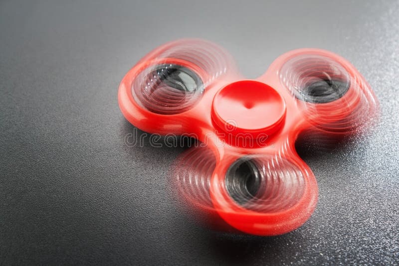 Super Popular Finger Spinner Fidget Device. Stock Photo - Image of ...