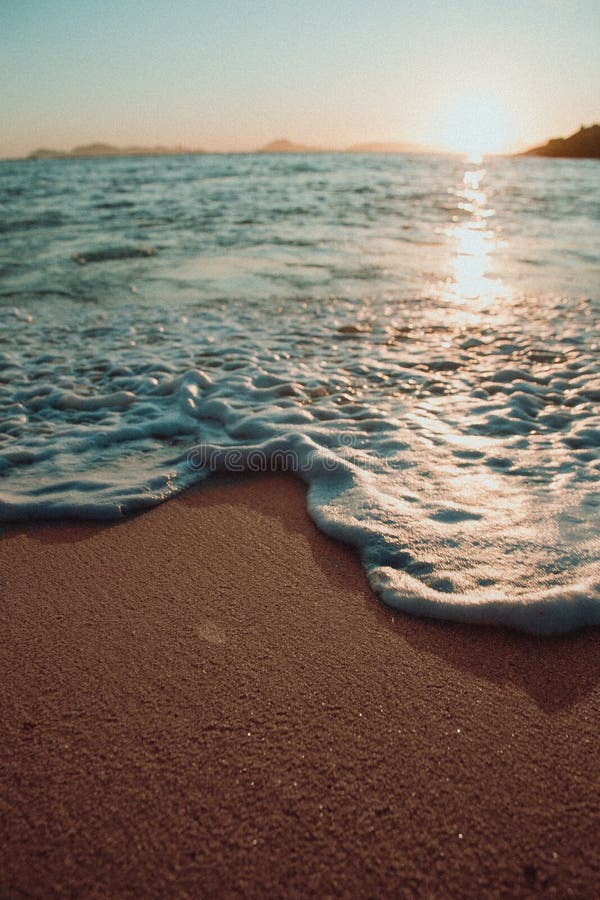 Super Sharp Tide with a Lot of Foam Entering Over the Sand of the Beach ...