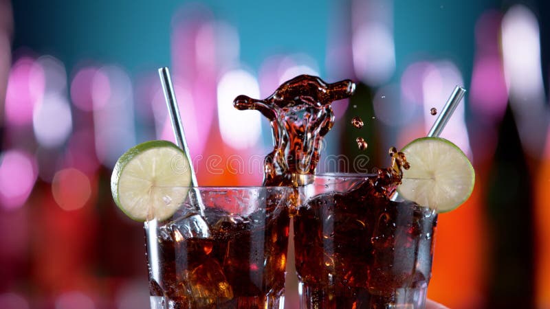 Super Slow Motion of Cola Based Drinks in Cheers Gesture. Stock Video ...