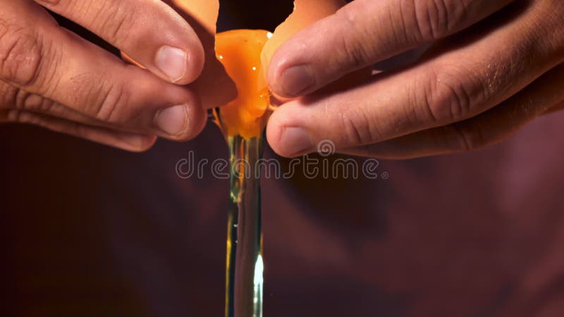 Super Slow Motion Hands of a Man with a Falling Raw Egg Stock Video ...