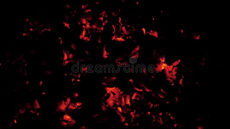 Super Slow Motion Shot of Glowing Coal and Fire Sparks Isolated on ...