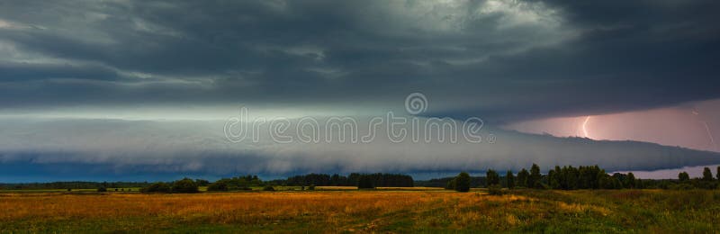 Supercell Cloud with Distant Lightning Illuminating the Storm Structure ...