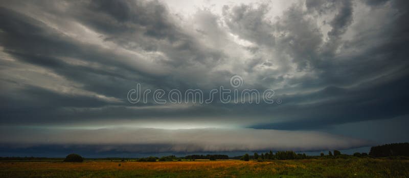 Supercell Cloud with Distant Lightning Illuminating the Storm Structure ...