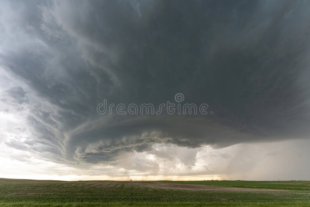 Supercell Storm Clouds Gathering Over Green Fields Stock Image - Image ...