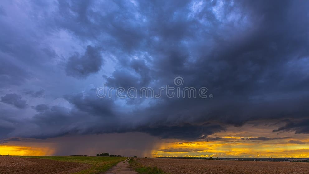 Supercell Storm Clouds with Wall Cloud and Intense Rain Stock Photo ...