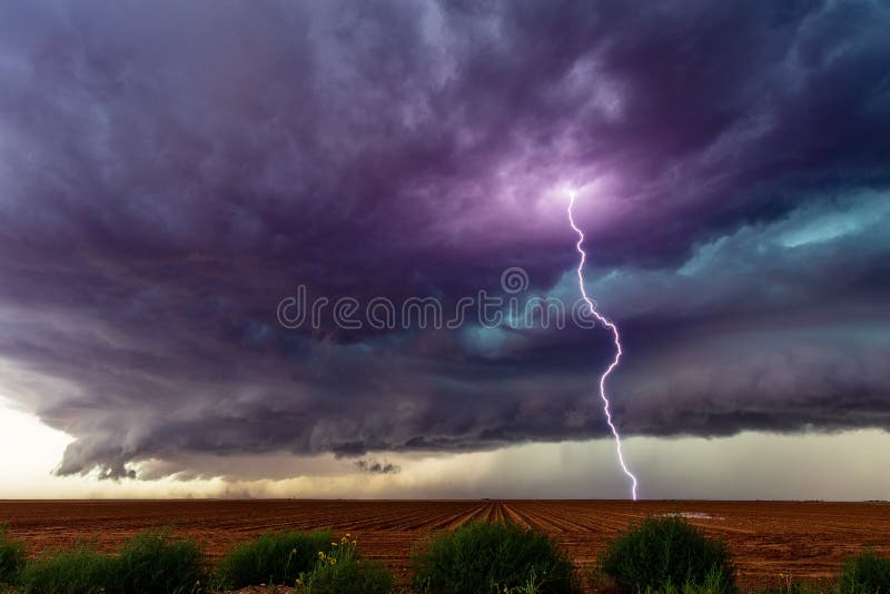 Supercell Thunderstorm with Dark Clouds and Lightning. Stock Photo ...