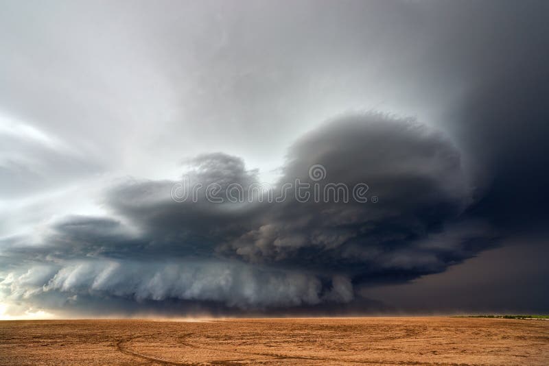 Supercell Thunderstorm with Lightning Bolt and Dark Storm Clouds Stock ...