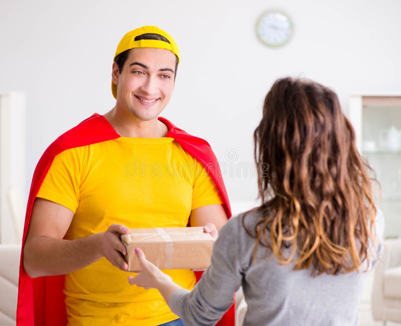 Superhero Delivery Guy with Box Stock Photo - Image of male, christmas ...