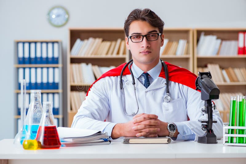 The superhero doctor working in the hospital lab. Checkup, practice ...