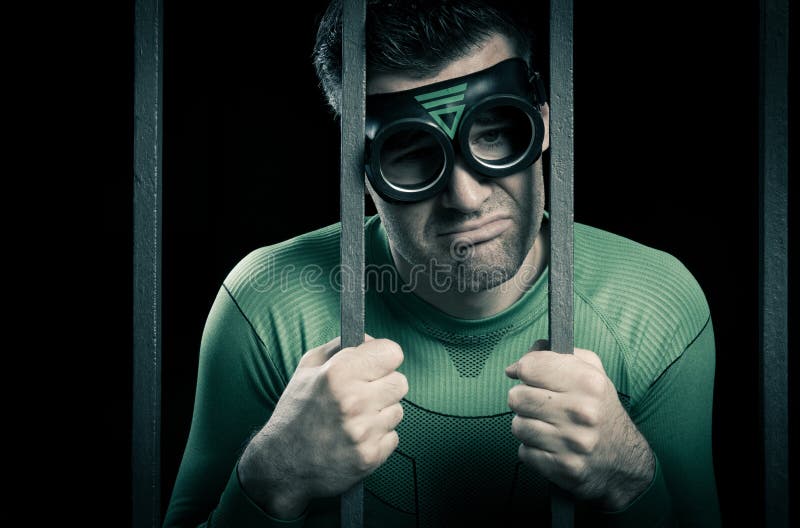 Superhero locked in prison stock photo. Image of fictional - 47767358