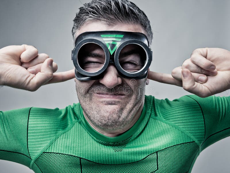 Superhero Plugging Ears with Fingers Stock Image - Image of plugging ...