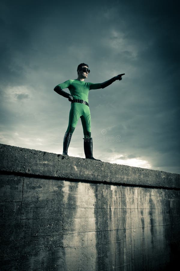 Superhero Pointing Dramatic Background Stock Photos - Free & Royalty ...