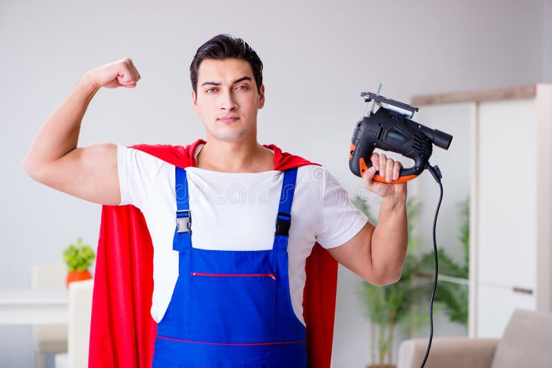 The Superhero Repairman with Tools in Repair Concept Stock Photo ...