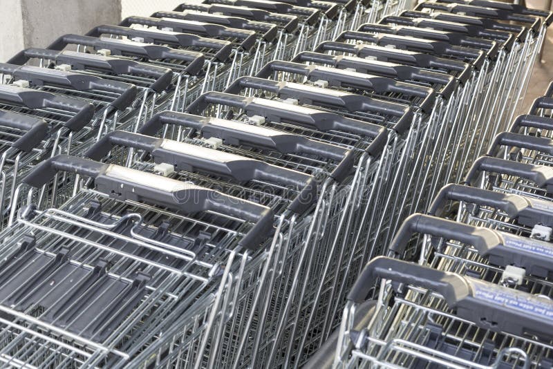 Supermarket carts in row stock image. Image of supermarket - 271846151