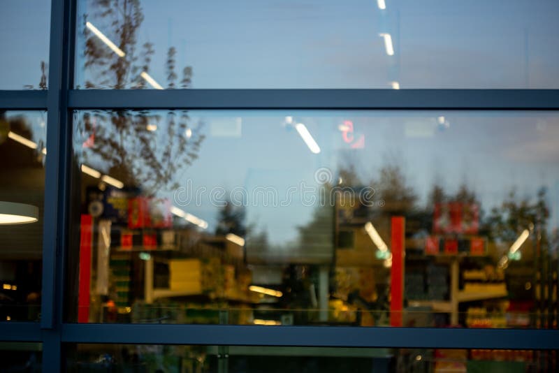 Supermarket Store Windows with Lights and Advertisements Inside Stock ...