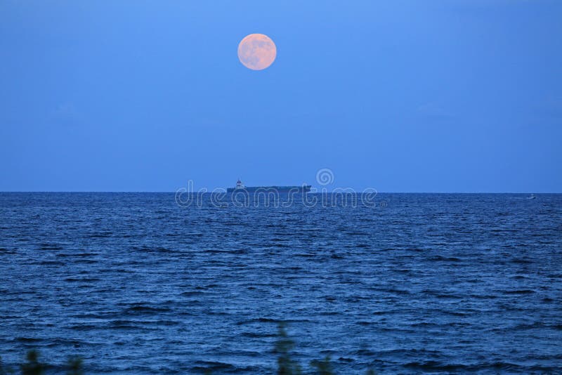 Supermoon stock photo. Image of over, bright, ocean, full - 44369784
