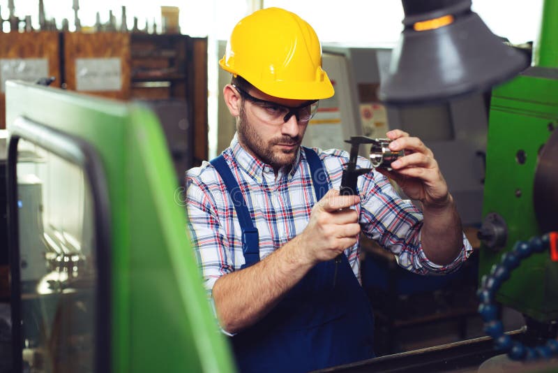 Supervisor Doing Quality Control and Production Check in Factory Stock ...
