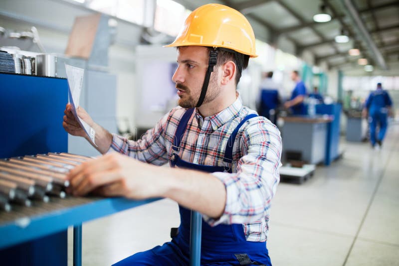 Supervisor Doing Quality Control and Pruduction Check in Factory Stock ...