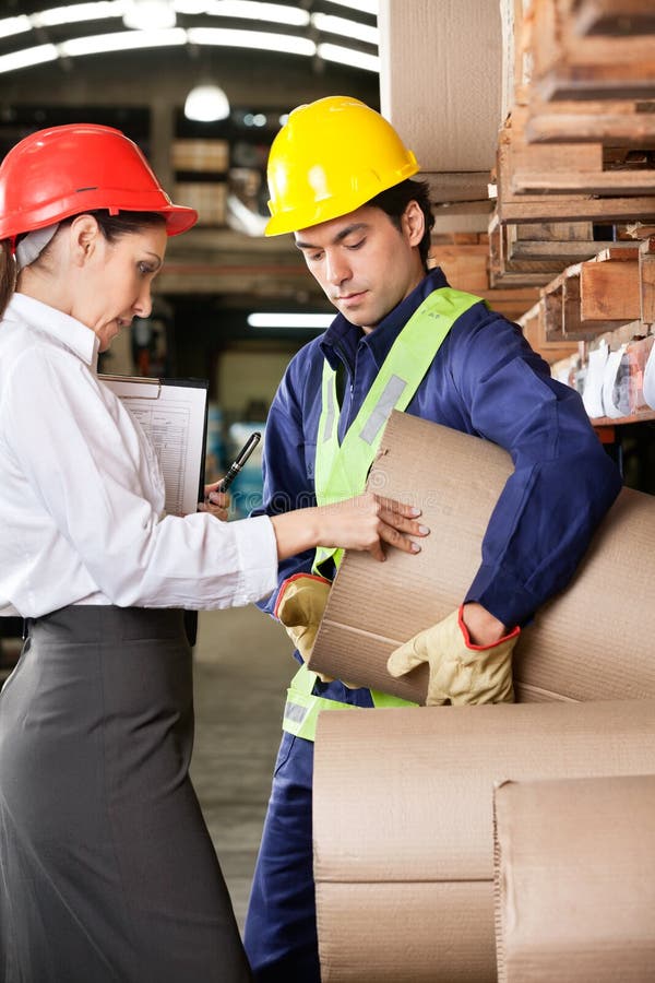 Supervisor and Foreman Checking Cardboard at Stock Photo - Image of ...