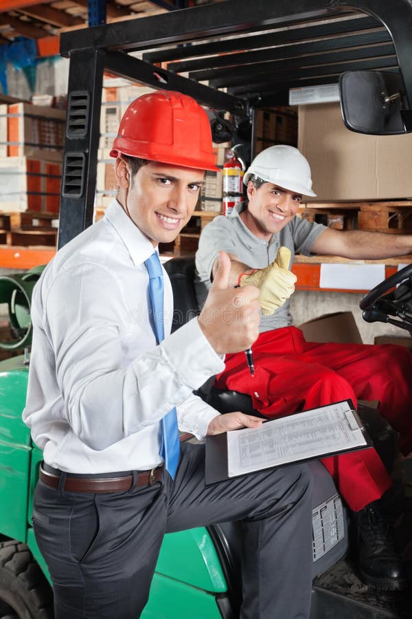 Supervisor and Forklift Driver Gesturing Thumbs Up Stock Image - Image ...