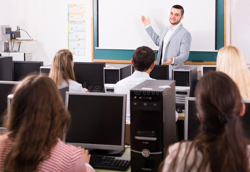 Supervisor Giving Instructions To Team Stock Photo - Image of faces ...