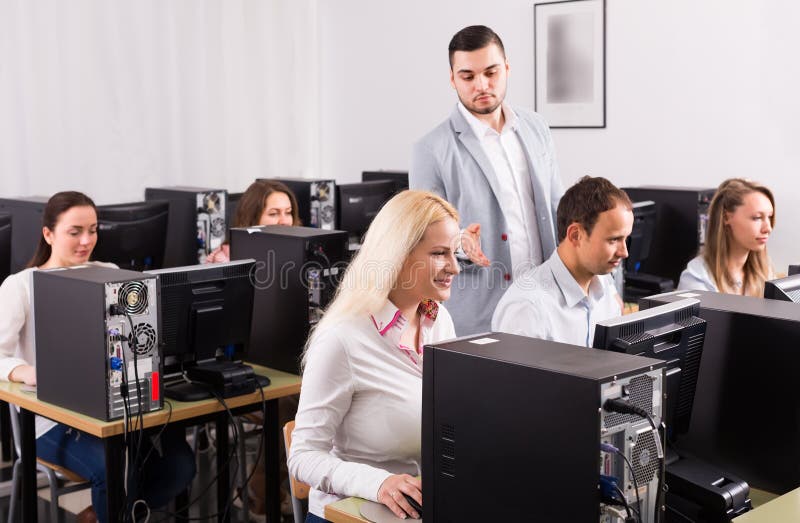 Supervisor Giving Instructions To Team Stock Image - Image of indoors ...