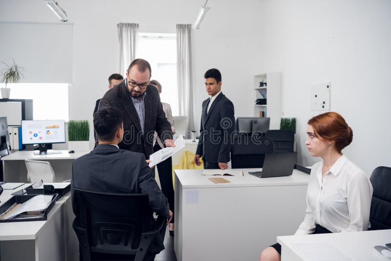The Supervisor Inspects the Work of Junior Managers in the Office of an ...