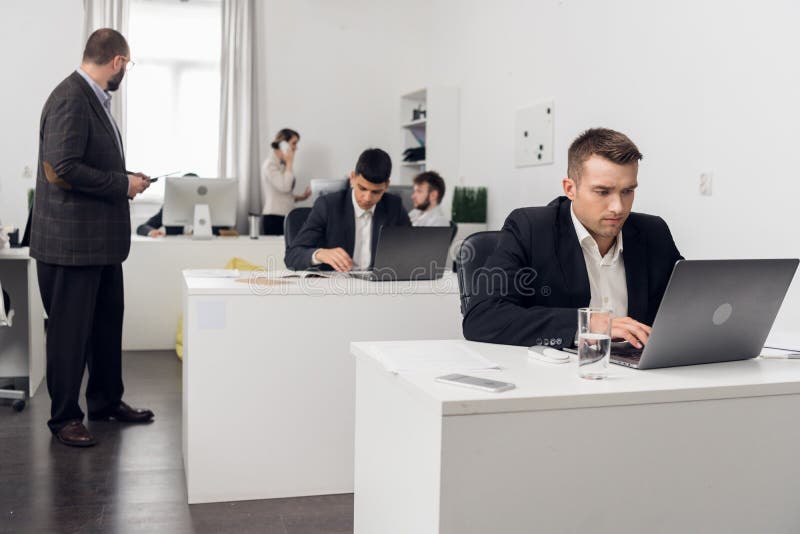 The Supervisor Inspects the Work of Junior Managers in the Office of an ...