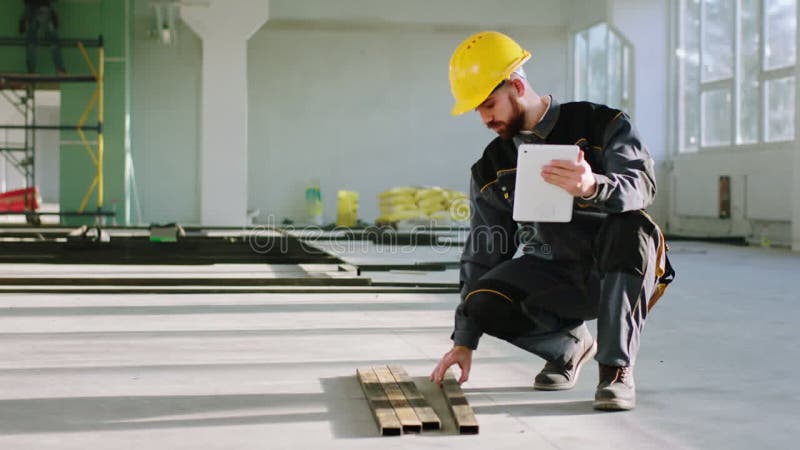 Details Closeup at Construction Site Working Concentrated Constructor ...