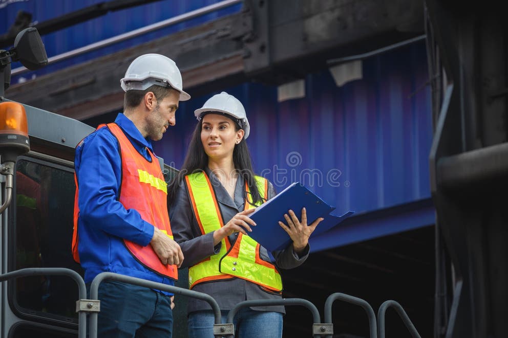 Supervisor in Safety Gear and Engineer in Hardhat Checking and Control ...