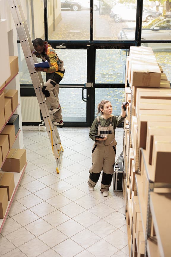 Supervisor Scanning Boxes Barcode Using Store Scanner Stock Image ...