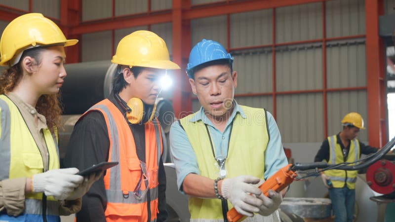 Supervisor Senior Man Training Controlling Overhead Crane with Remote ...